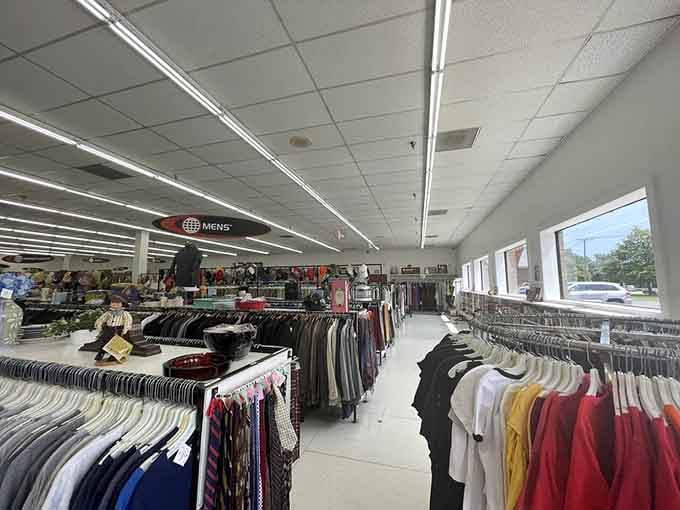 Endless racks under bright lights mean you can actually see what you're buying, revolutionary concept for thrift stores.