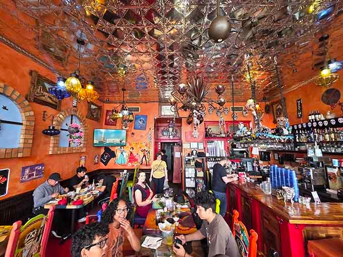 When a ceiling looks like a celebration exploded in the best possible way, you know you're in for something special.