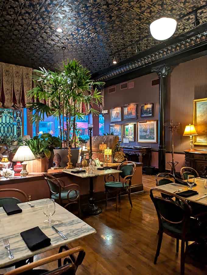 Pressed tin ceilings, vintage lamps, and artwork everywhere&mdash;it's like dining in a sophisticated friend's impossibly elegant living room.