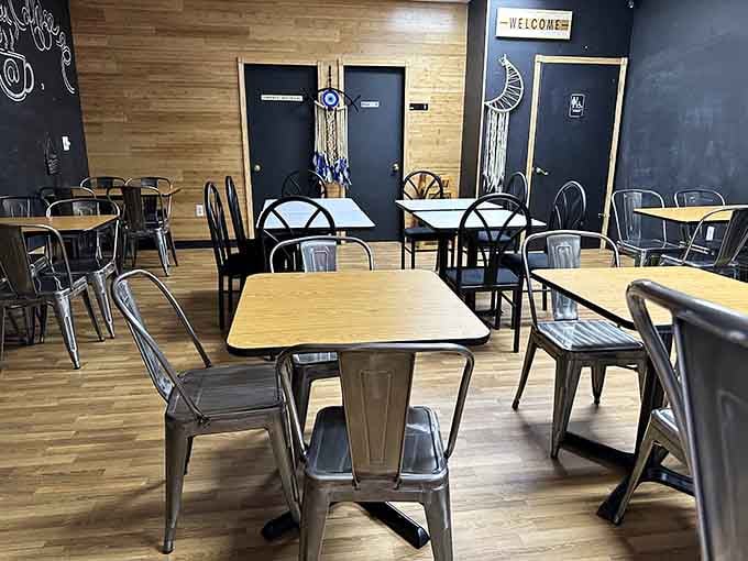 Industrial chic meets cozy breakfast nook, where metal chairs and wooden tables set the stage for waffle wizardry.