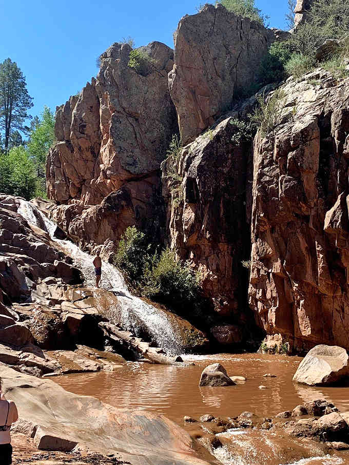Water tumbles through ancient rock like liquid poetry, creating Arizona's best-kept secret in the Rim Country.