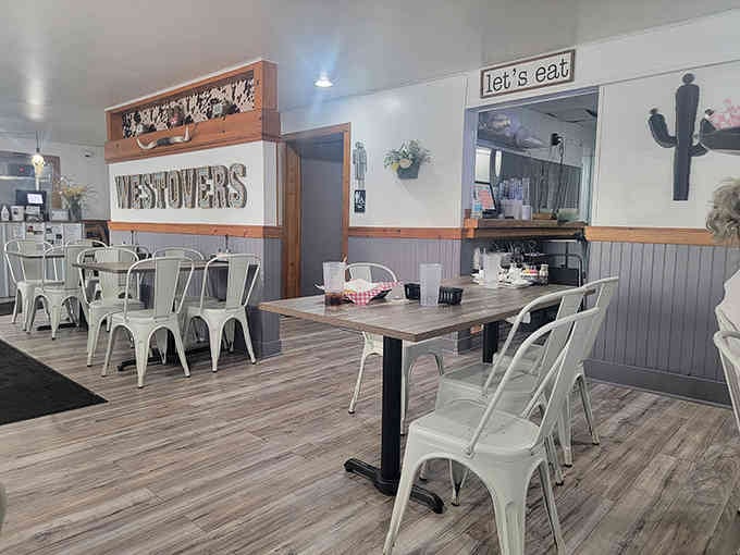 Clean lines and farmhouse charm create a dining room where comfort food meets contemporary style beautifully.