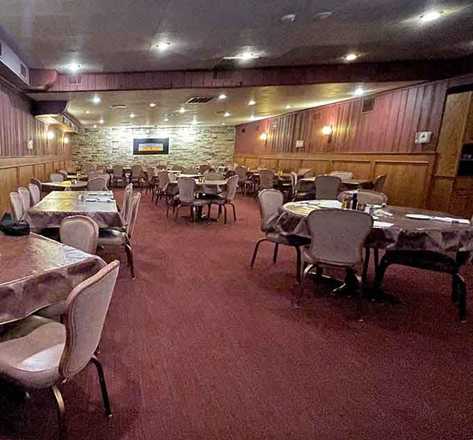 Wood paneling and cozy seats create the perfect setting for a meal that demands your full, undivided attention.