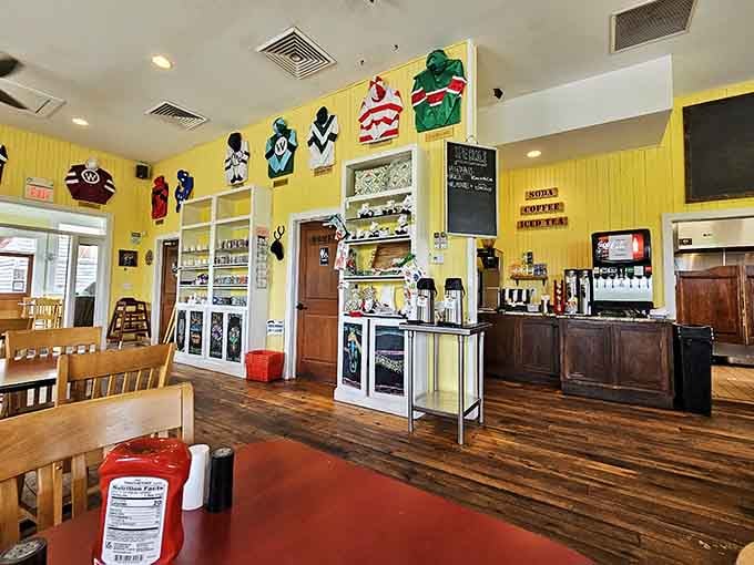 Yellow walls and racing silks create the kind of cheerful atmosphere that makes every morning feel like Saturday.