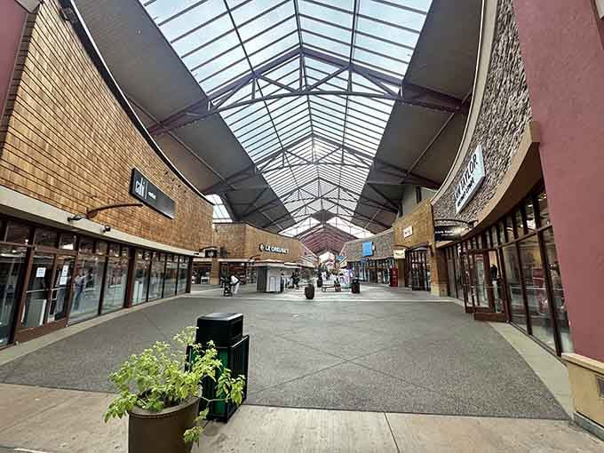 Wide walkways and skylights create a shopping experience that's actually pleasant, imagine that in an outlet mall.