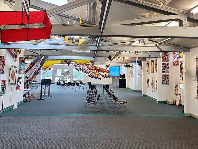 Step inside and look up&mdash;kites suspended overhead create an indoor sky that never needs wind to impress.