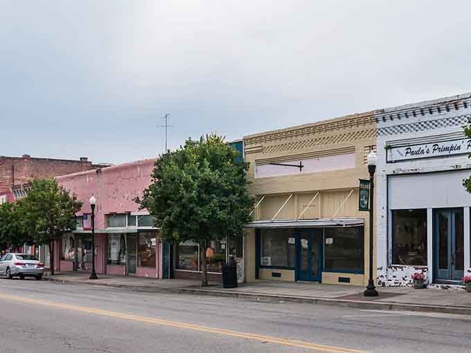Main Street storefronts stand shoulder to shoulder like old friends who've weathered every storm together since Eisenhower.
