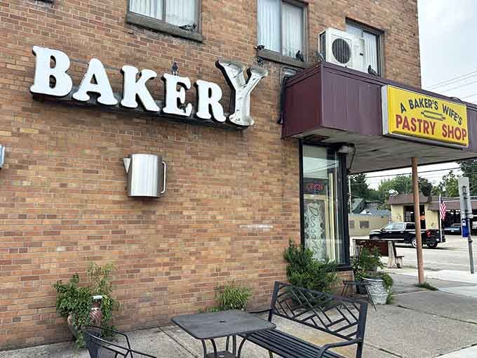 The classic brick building and corner bench invite you to slow down and savor something sweet today.