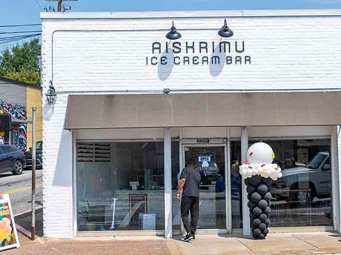 Clean white brick and minimalist charm &ndash; this is where ice cream meets modern sophistication beautifully.