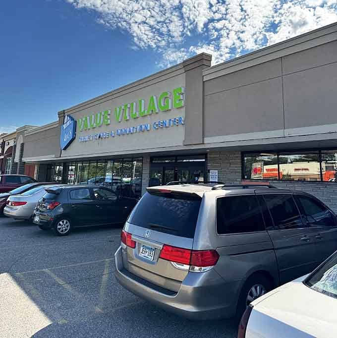The bright green letters practically shout "come find amazing deals" to everyone driving past this shopping center.