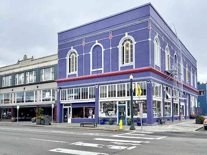 That bold purple corner building commands attention like a jewel box in downtown Astoria's collection.