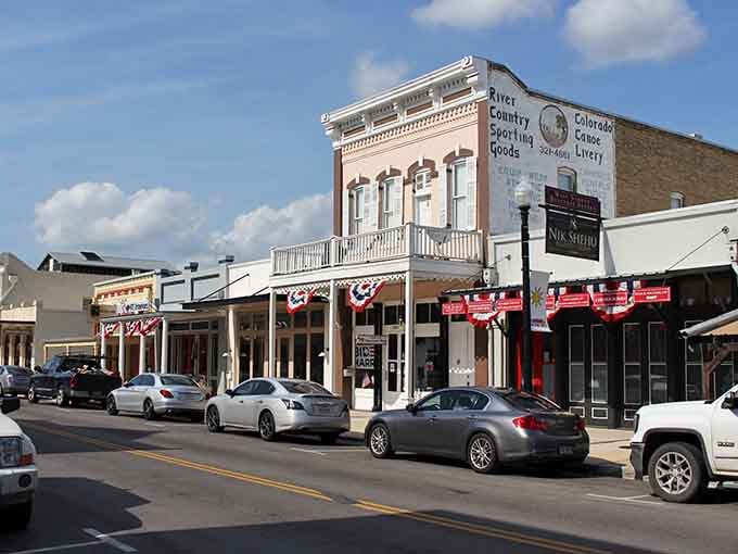 Those classic storefronts with their patriotic bunting remind you of Main Street USA before the malls took over.