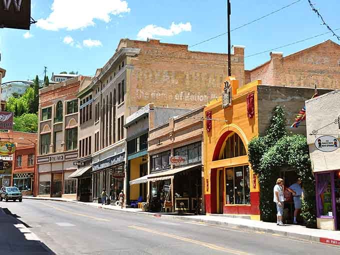Brick buildings climb the hillside in a rainbow of colors, proving that mining towns can age like fine wine.