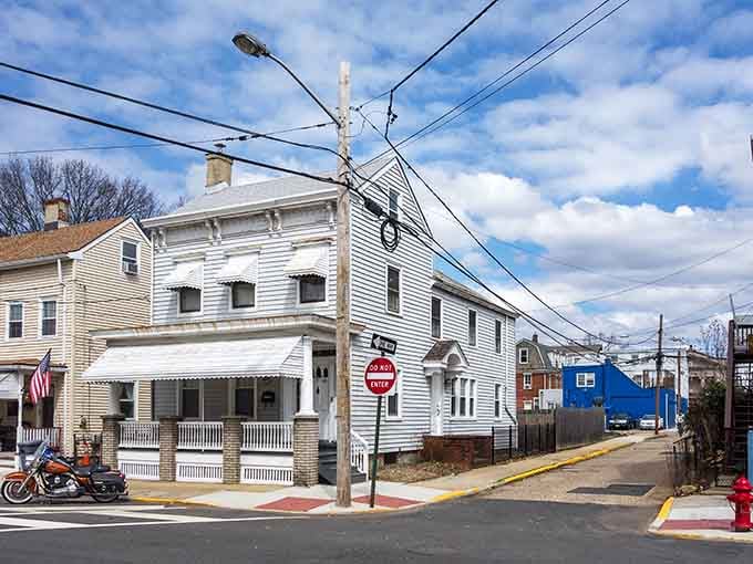 Classic white clapboard architecture lines these quiet streets where neighbors still know each other's names by heart.