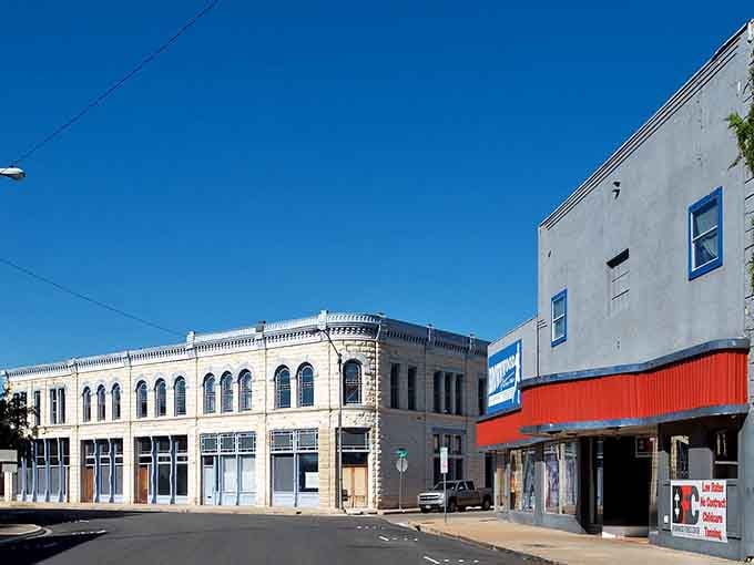 These grand facades whisper stories of prosperity when downtown was the only place that mattered.