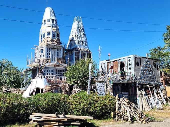 This folk art wonderland rises from the earth like a fever dream built from determination and recycled treasures.