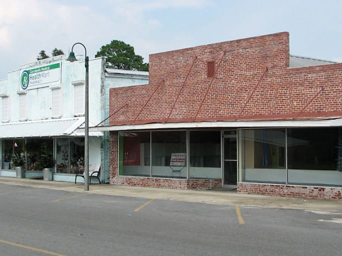 Weathered brick and wide sidewalks tell stories of a simpler time in this Gulf Coast fishing village.