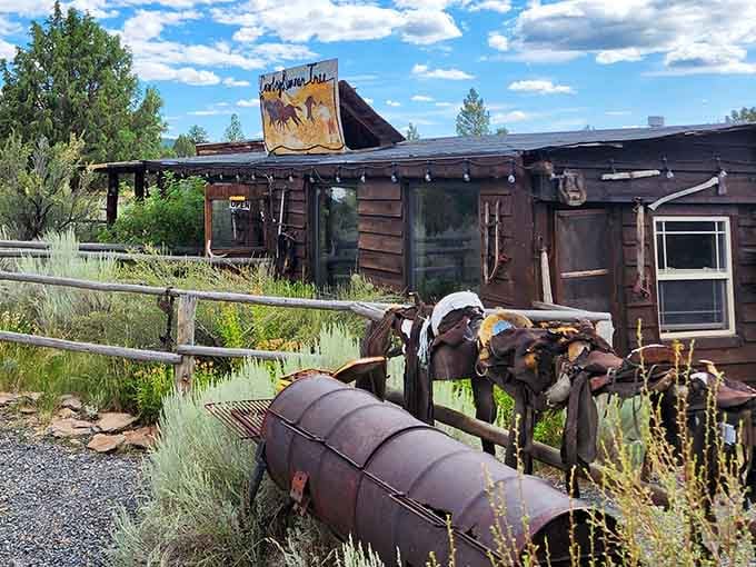 Rustic ranch charm meets serious appetite satisfaction where vintage saddles and weathered wood set the stage for legendary meals.