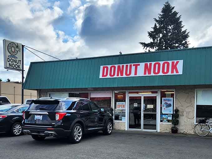 Classic donut shop charm with a parking lot full of cars proves the locals know where quality lives.