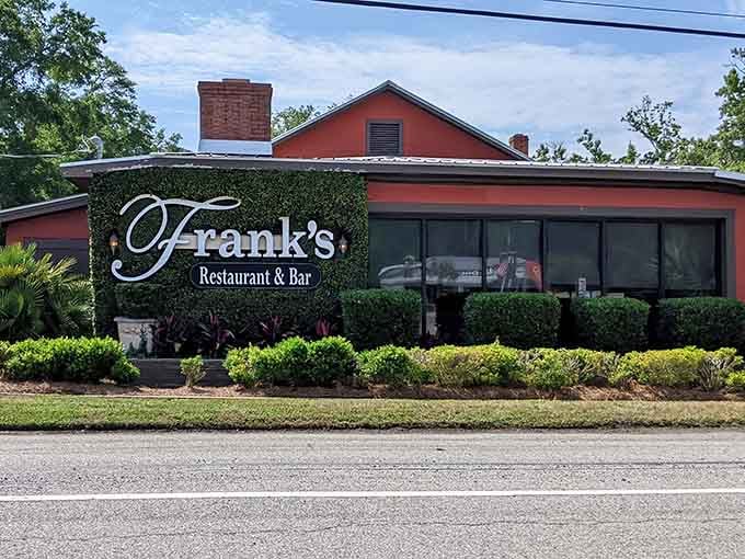 That elegant script on the hedges tells you Frank's means business when it comes to coastal dining and Southern hospitality.