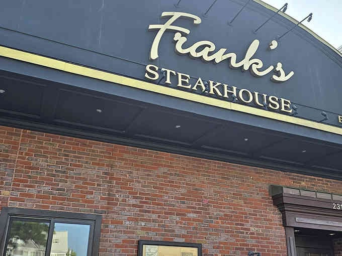 Frank's elegant script lettering whispers "old-school excellence" like a Sinatra song playing softly in your mind.