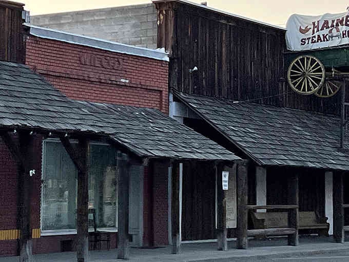 Weathered wood and that iconic covered wagon create an Old West atmosphere Clint Eastwood would appreciate.