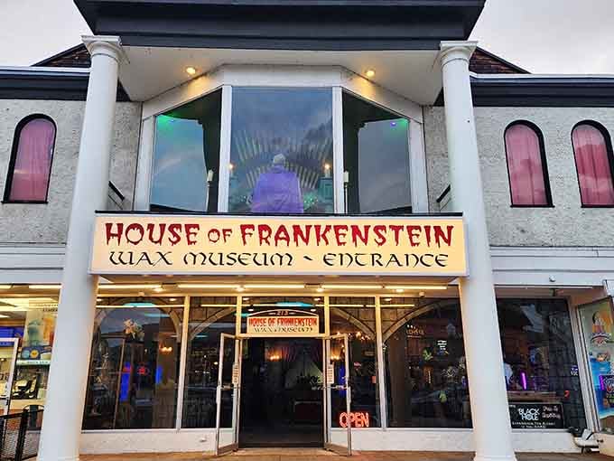 The House of Frankenstein beckons with purple-tinted windows that promise delightfully spooky encounters with classic movie monsters inside.