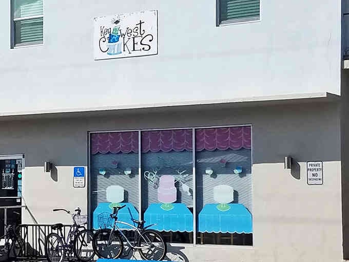 Window art featuring whimsical cakes tells you everything you need to know about the sweet creativity happening behind these doors.