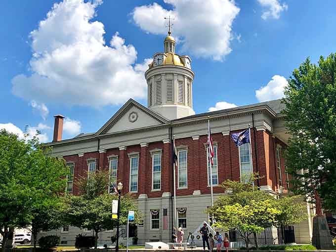 Madison's courthouse stands proud with its golden dome gleaming against blue skies, a testament to architectural beauty.