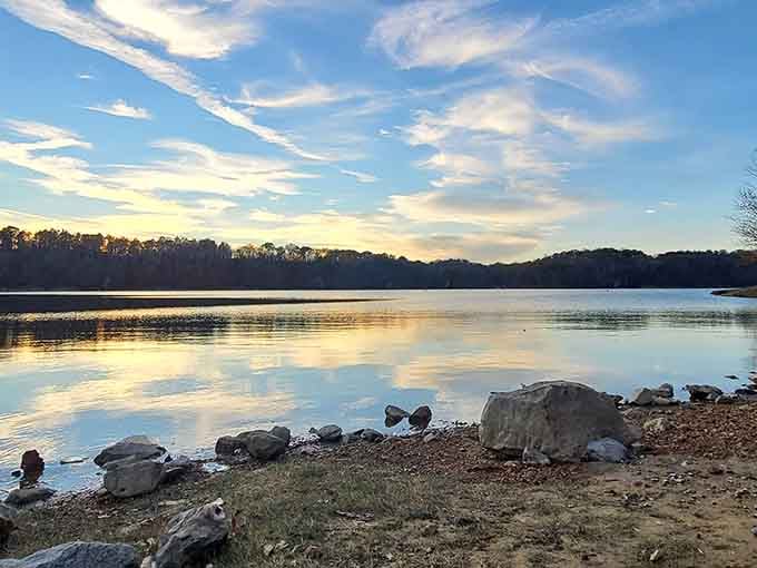 Golden hour at the spillway creates a mirror so perfect, you'll question which way is up.