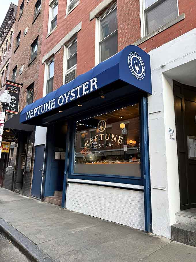 That bold blue awning signals fresh oysters waiting inside this cozy North End gem that locals guard like a secret.