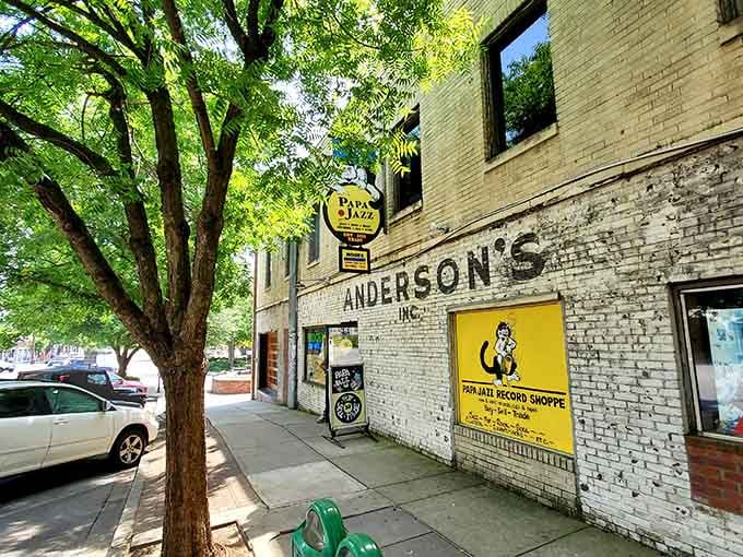 Shaded by leafy trees on a charming street, this brick building whispers stories of jazz legends and timeless melodies.