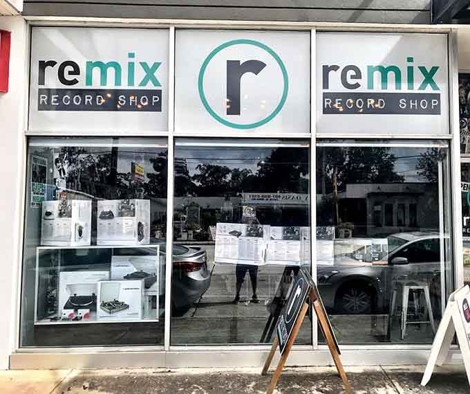 Clean storefront windows displaying turntables like jewelry – because that's exactly what they are to collectors who know.