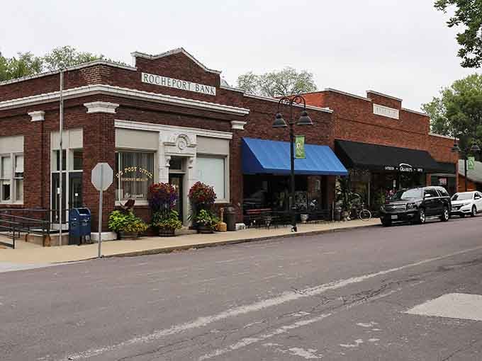 The Rocheport Bank building anchors this riverside street where blue awnings beckon you inside for local treasures and conversation.