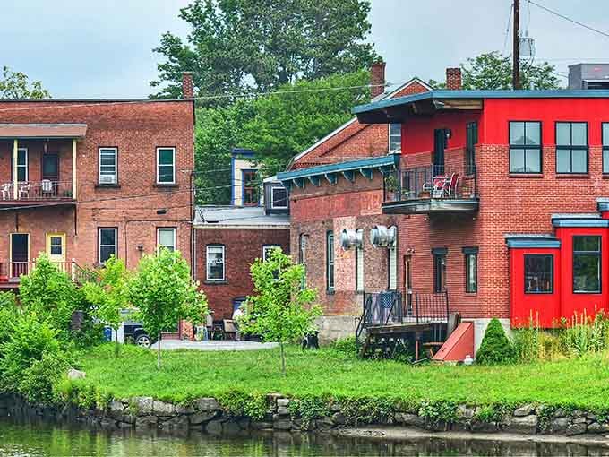 Riverside living meets creative dining where colorful buildings pop against the water like a painter's palette.