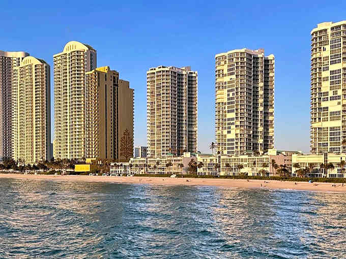 These gleaming towers rise from the sand like a modern-day Atlantis, where beach life meets high-rise luxury.