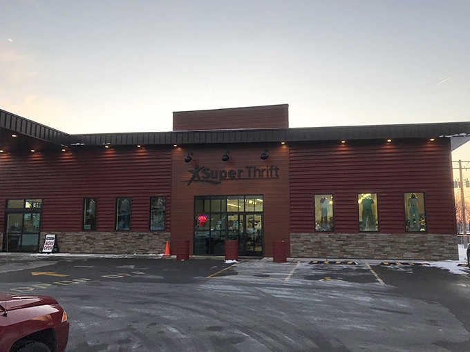 The russet-toned exterior glows warmly at dusk, promising a warehouse full of secondhand wonders just beyond the entrance.