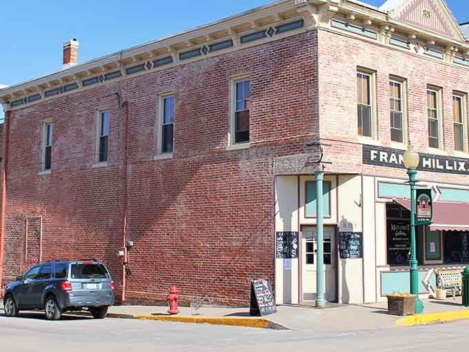 Corner buildings like this have watched generations pass by, and those bricks could tell some stories if they could talk.