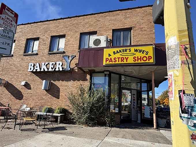 That bright yellow sign against brick tells you everything: this is where neighborhood traditions are made and kept.