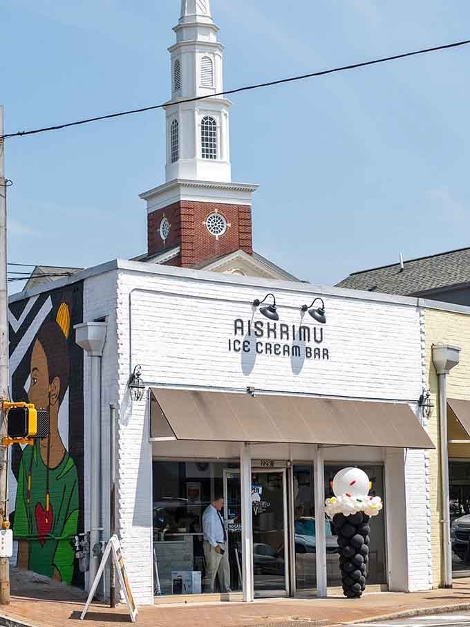 That church steeple backdrop makes your ice cream pilgrimage feel downright spiritual, doesn't it?