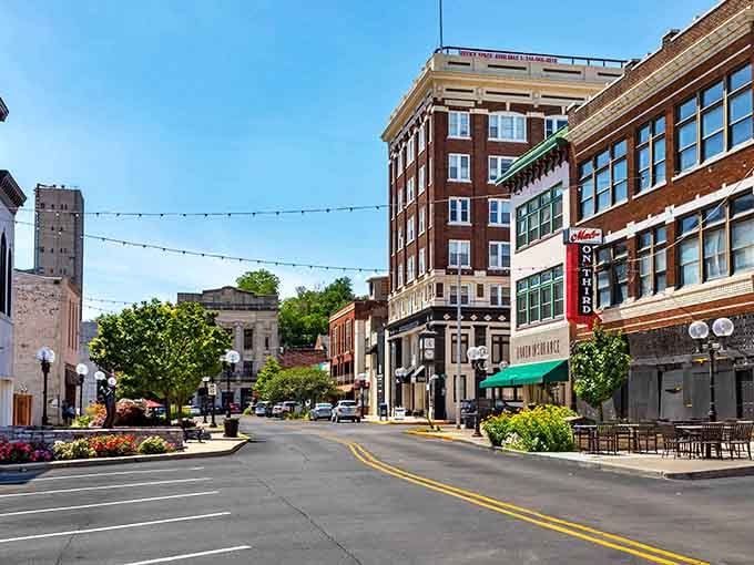 The mix of brick colors and architectural styles here tells decades of river town stories in one glance.