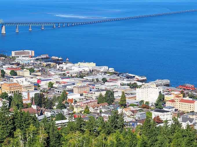 Astoria spreads across the hillside like a postcard from the past, bridges and all included.