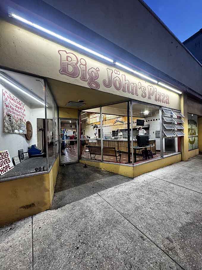 When the sun sets and those lights glow, Big John's becomes a beacon for anyone craving authentic thin-crust perfection.
