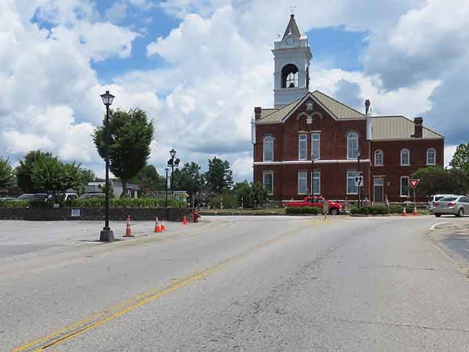 The red brick and white steeple combination is pure small-town Georgia, timeless as sweet tea on a summer afternoon.