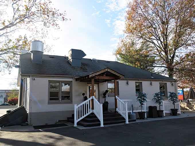 Morning light brightens this unassuming seafood haven, where the simple exterior hints at culinary treasures waiting inside for you.
