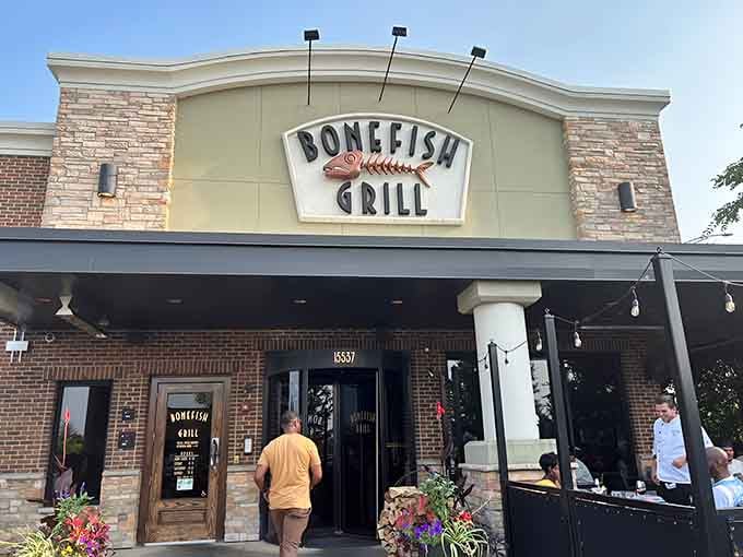 Daylight reveals Bonefish's inviting entrance, where casual elegance meets consistently delicious seafood in every thoughtful detail.