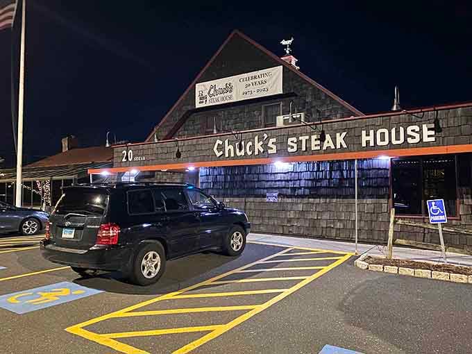 Evening falls and Chuck's lights up like a promise that dinner's going to be something special tonight.