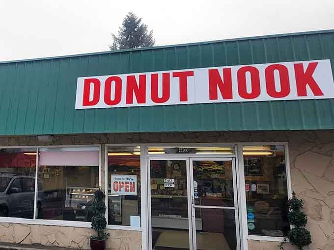 When the "OPEN" sign lights up under those dramatic clouds, you know fresh donuts are calling your name today.