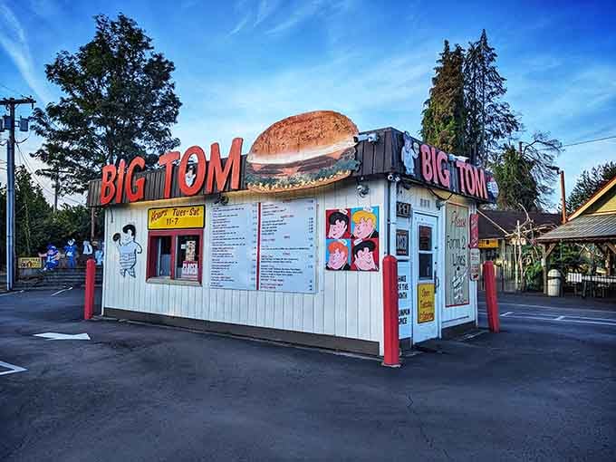 The vintage cartoon characters on the wall have watched countless customers tackle these legendary oversized burgers for years.