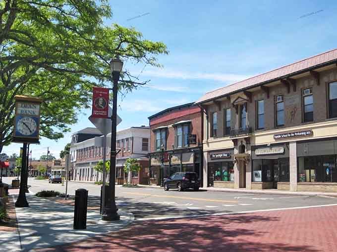 Brick sidewalks and local shops line streets where people actually stop to chat with their neighbors.